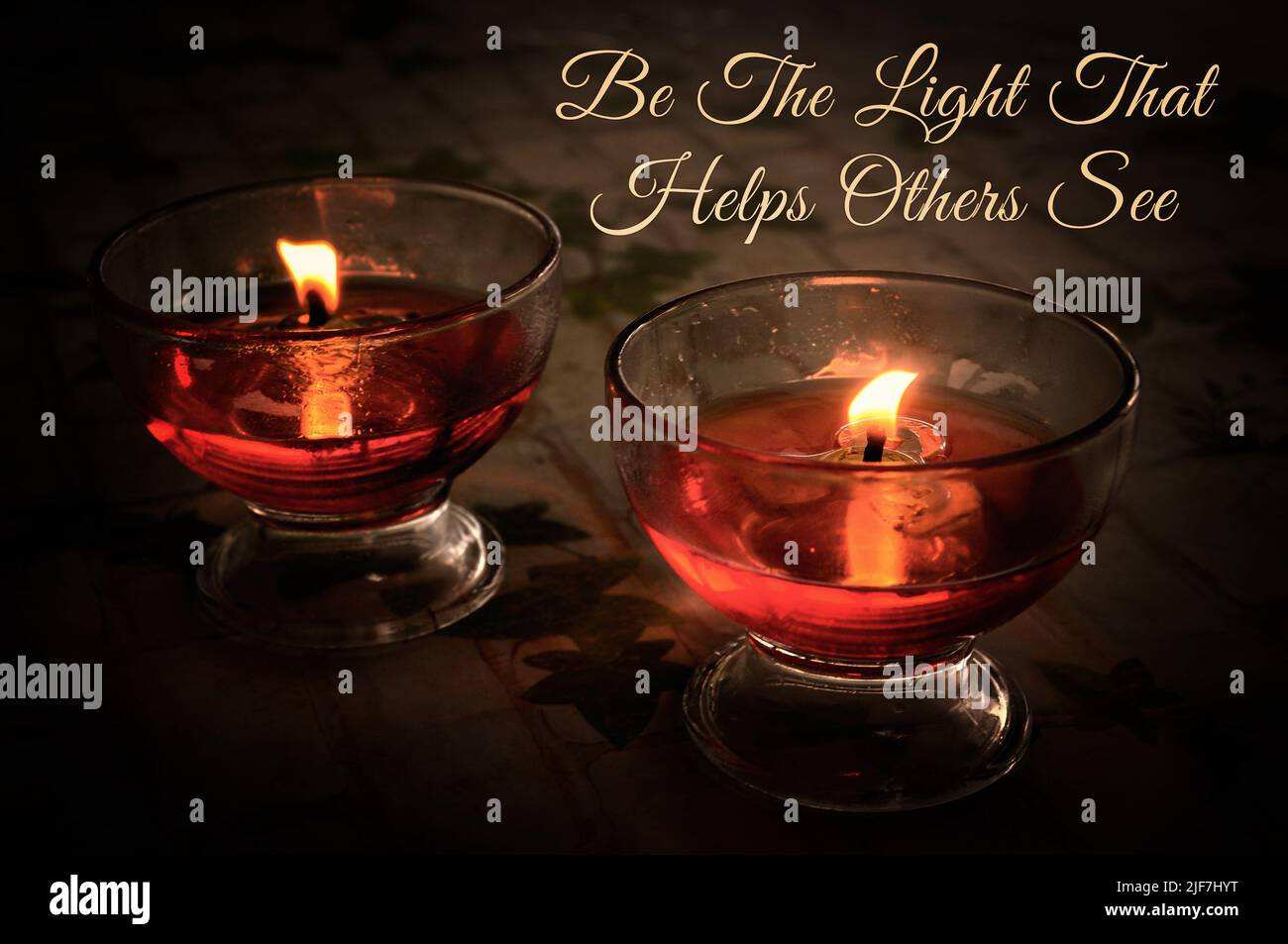 Inspirational quote - Be the light that helps others see. With candle ...