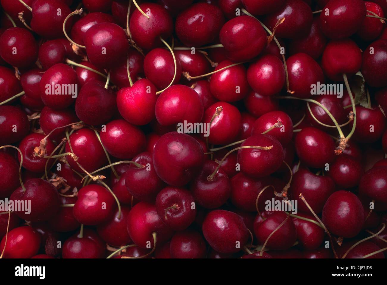 Background top view of ripe sweet cherries texture. Close up fruit ...