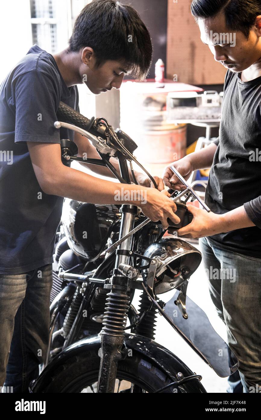 Early motorcycle mechanics hi-res stock photography and images - Alamy