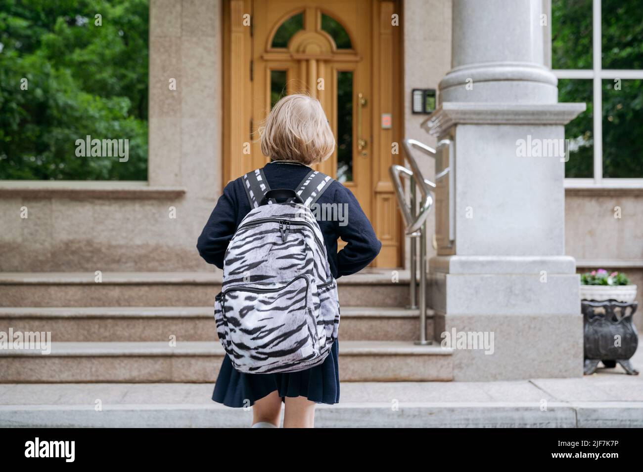 School girl back view uniform hi-res stock photography and images - Alamy