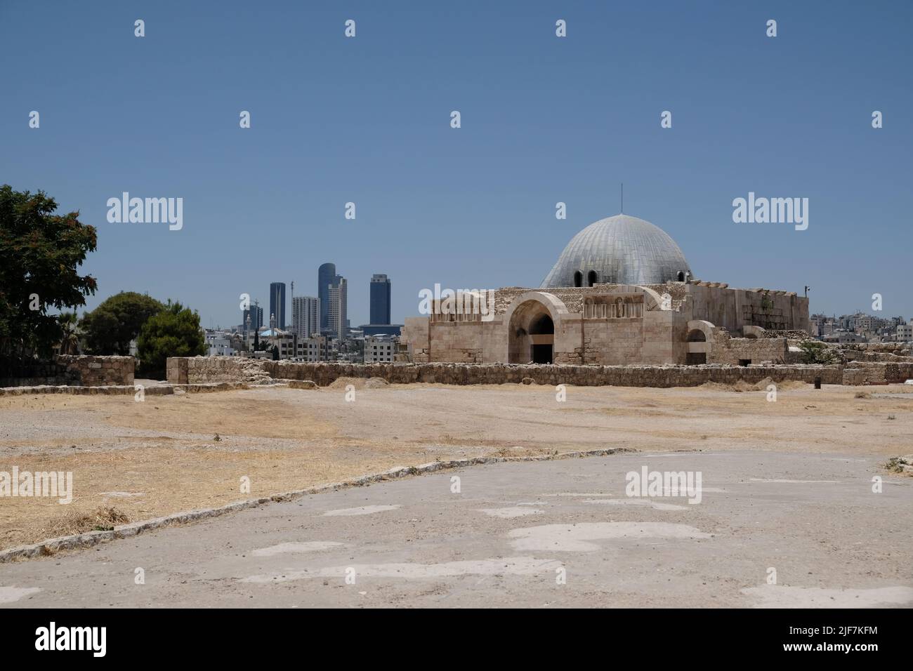 The ancient citadel in Amman Jordan with modern skyscrapers in the ...
