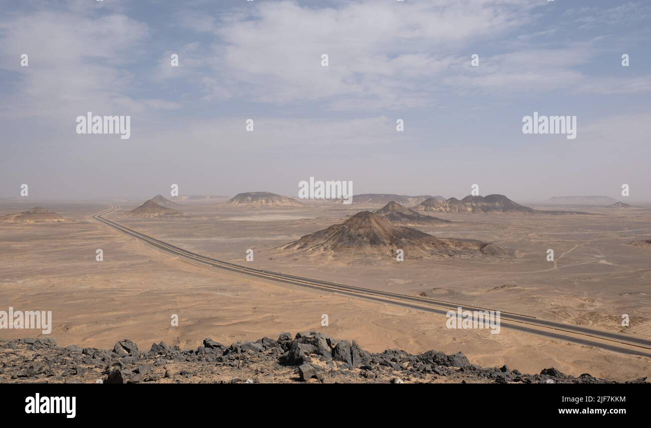 Long road through the desert in Egypt Stock Photo - Alamy