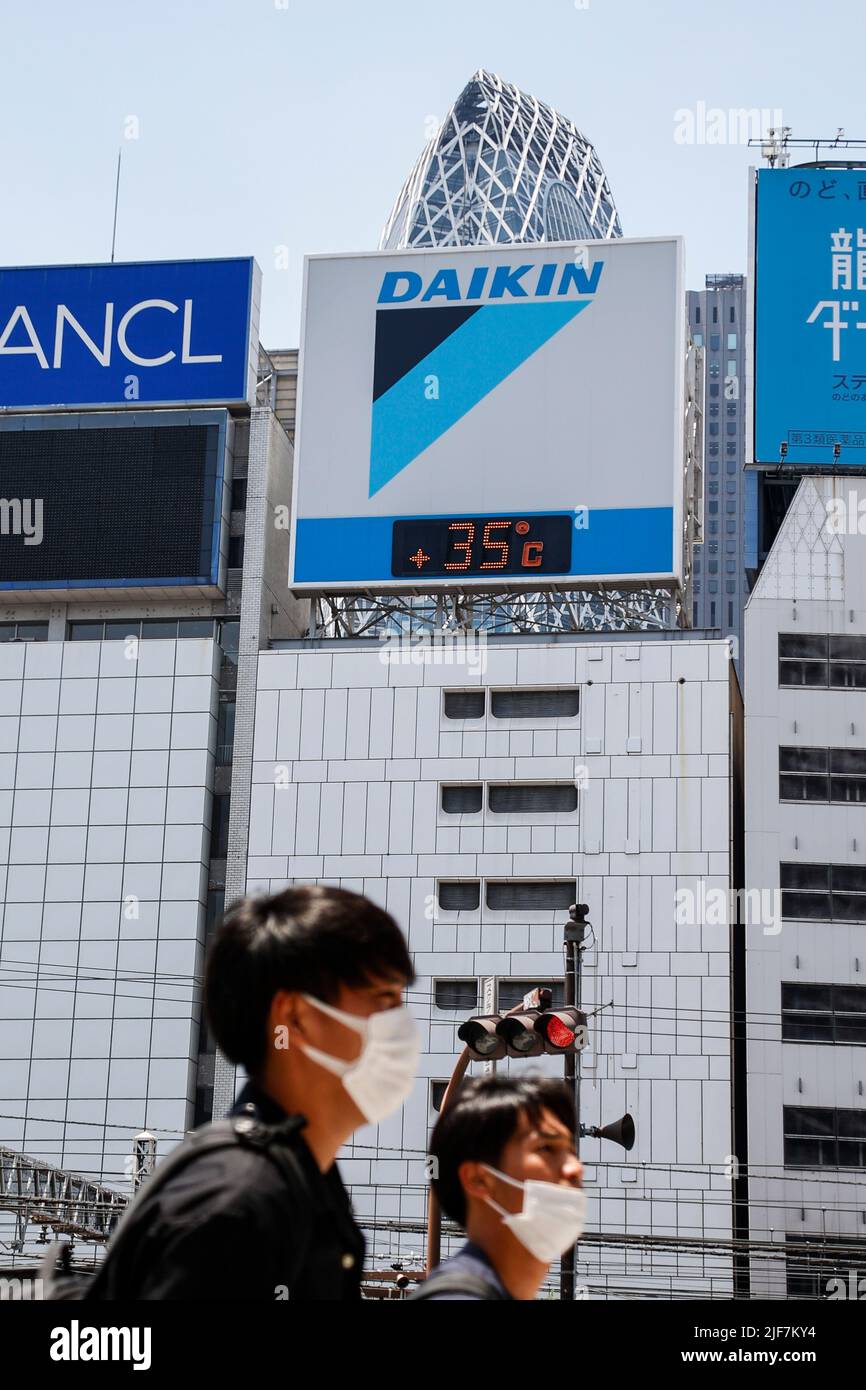 Tokyo, Japan. 30th June, 2022. A digital temperature display shows 35 ...