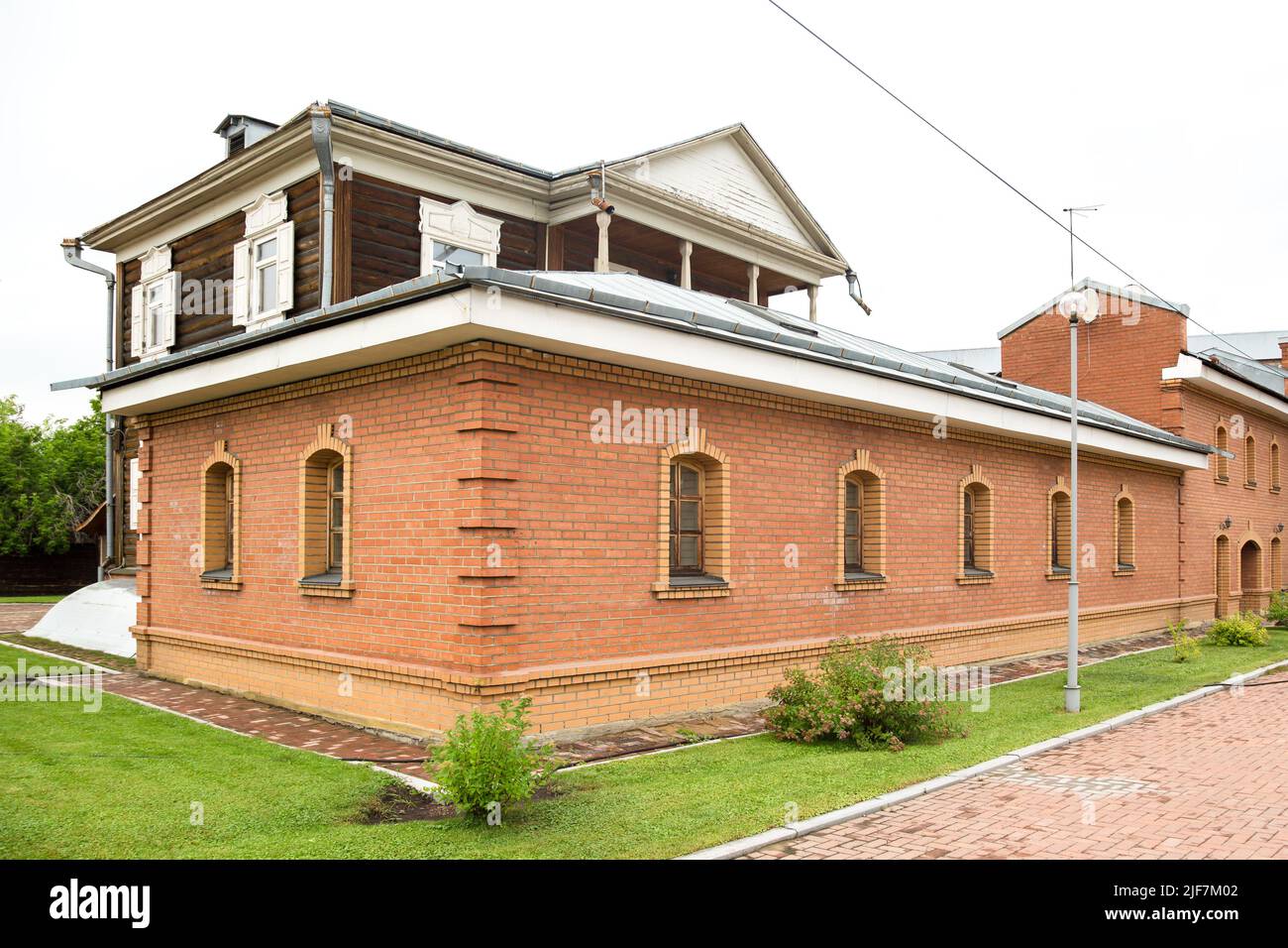 One-story red brick building for household needs Stock Photo - Alamy