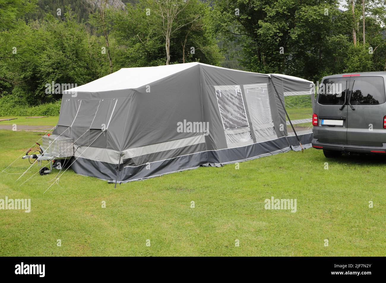 an old folding caravan on a campsite Stock Photo - Alamy