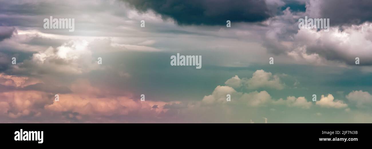Dramatic sky with dark clouds over a field, dark clouds before rain ...
