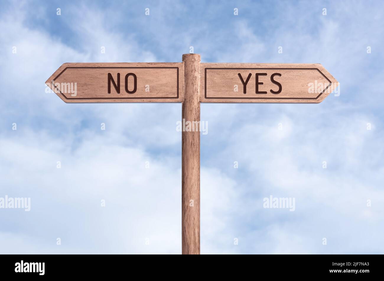 Yes or No concept. Words in opposite directions on signpost with sky ...