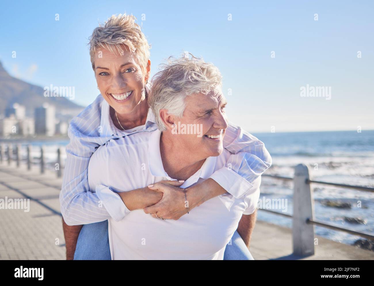A happy mature caucasian couple enjoying fresh air on vacation at the ...