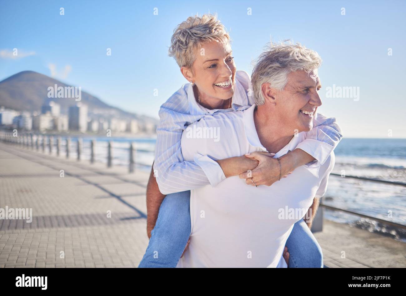 A happy mature caucasian couple enjoying fresh air on vacation at the ...