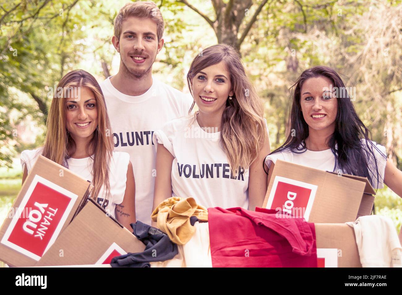 group of teenagers volunteering Stock Photo - Alamy