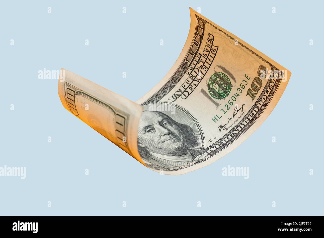 One hundred dollar bills fly hi-res stock photography and images - Alamy