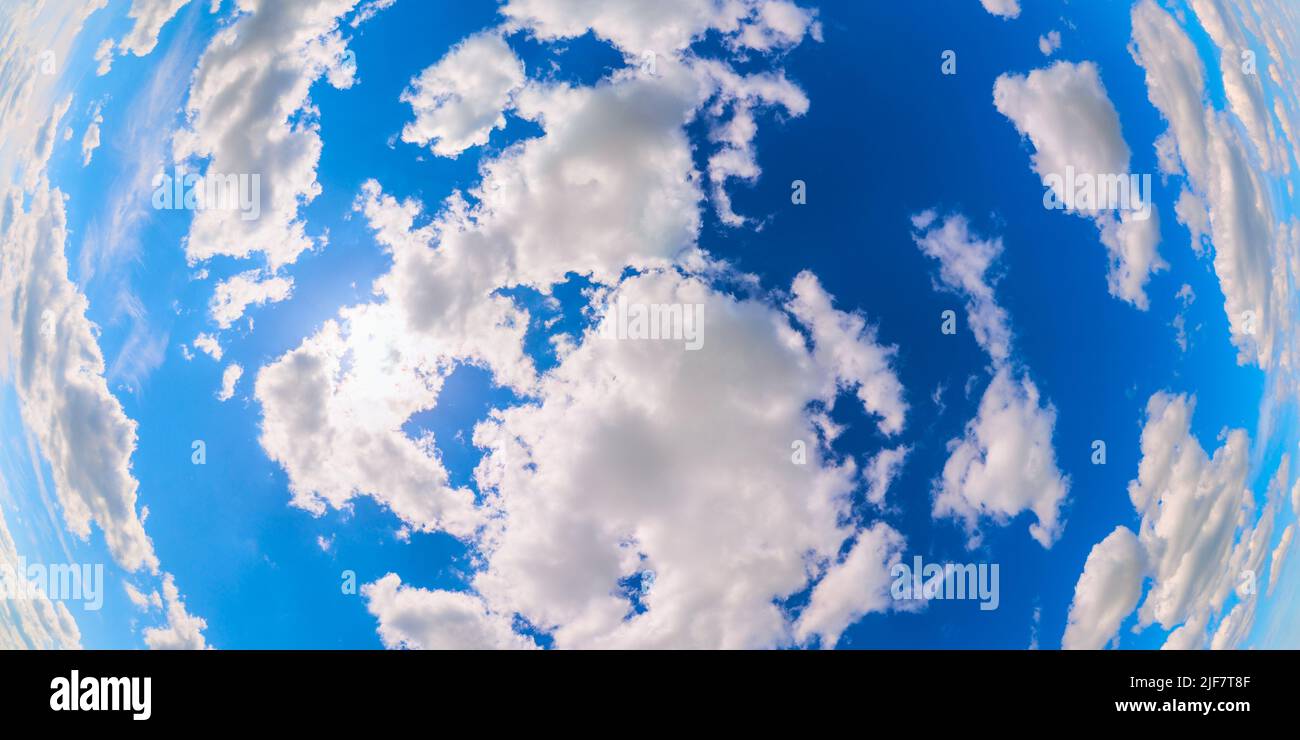 blue sky with white clouds at summer day fisheye projection in upward ...