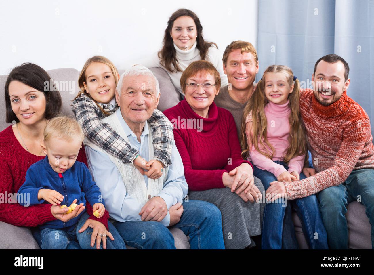 Family members making family photo Stock Photo - Alamy