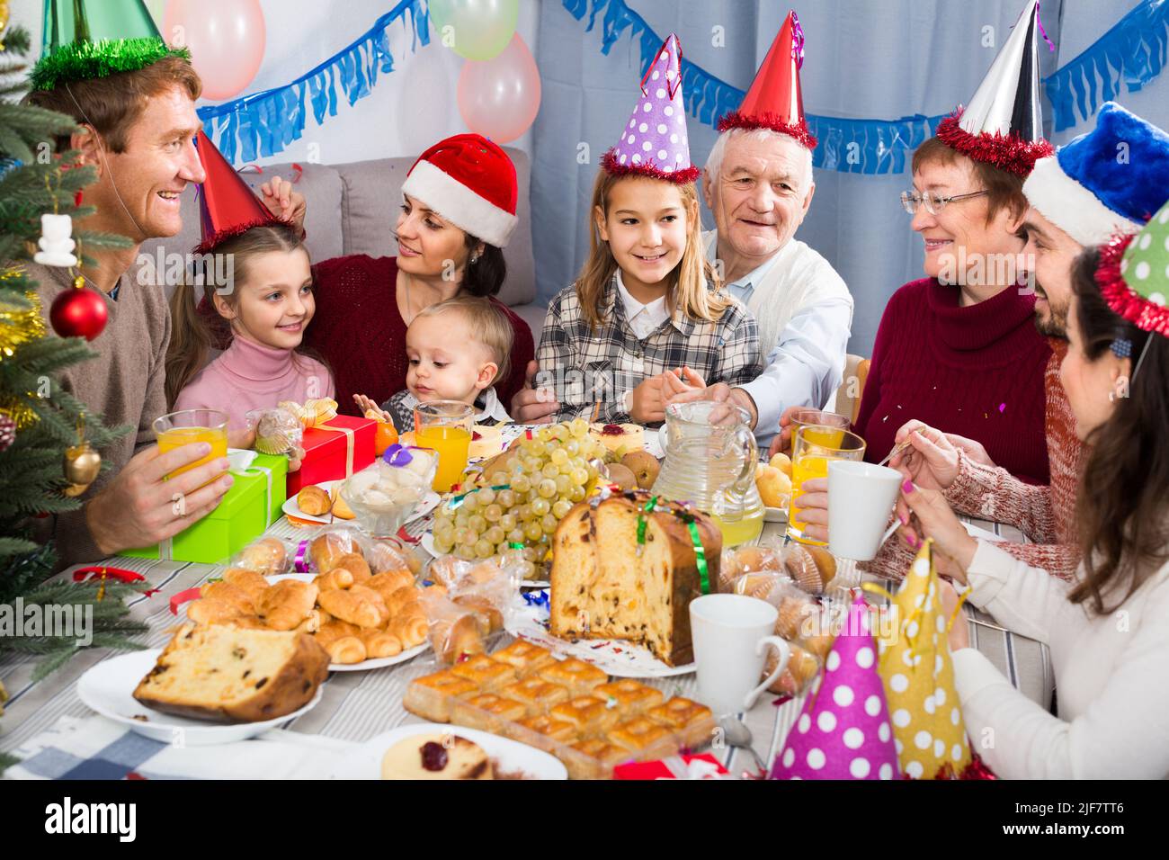family celebrating children’s birthday during festive dinner Stock ...