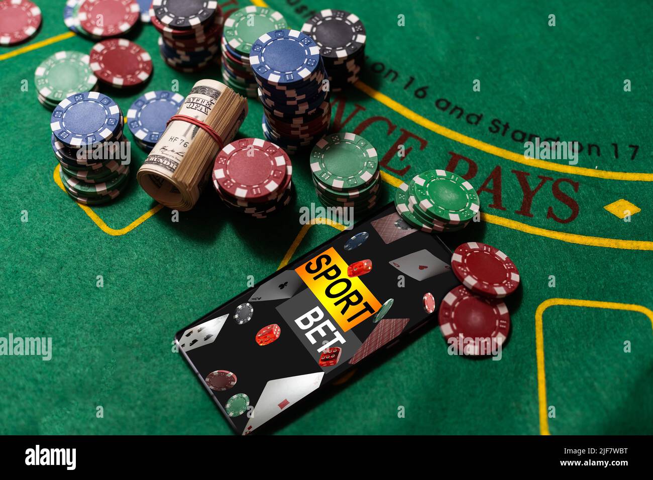 inscription your bet wins on a smartphone on the poker table Stock ...