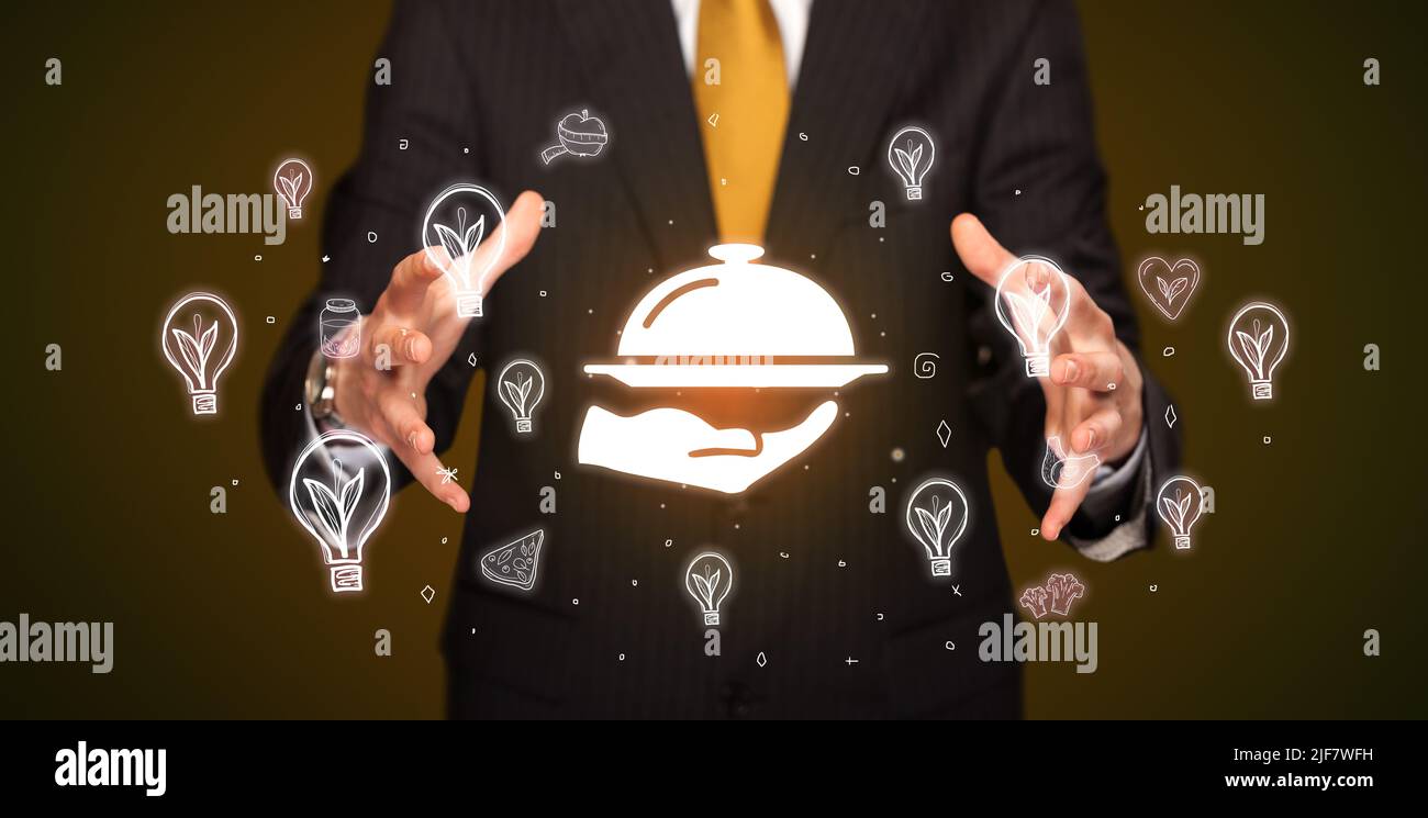 Hand holding food related hi-res stock photography and images - Alamy