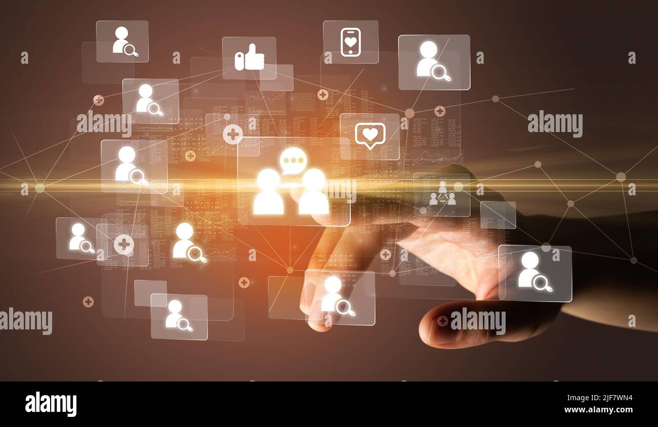 Hand pressing social media multimedia application screen with media ...