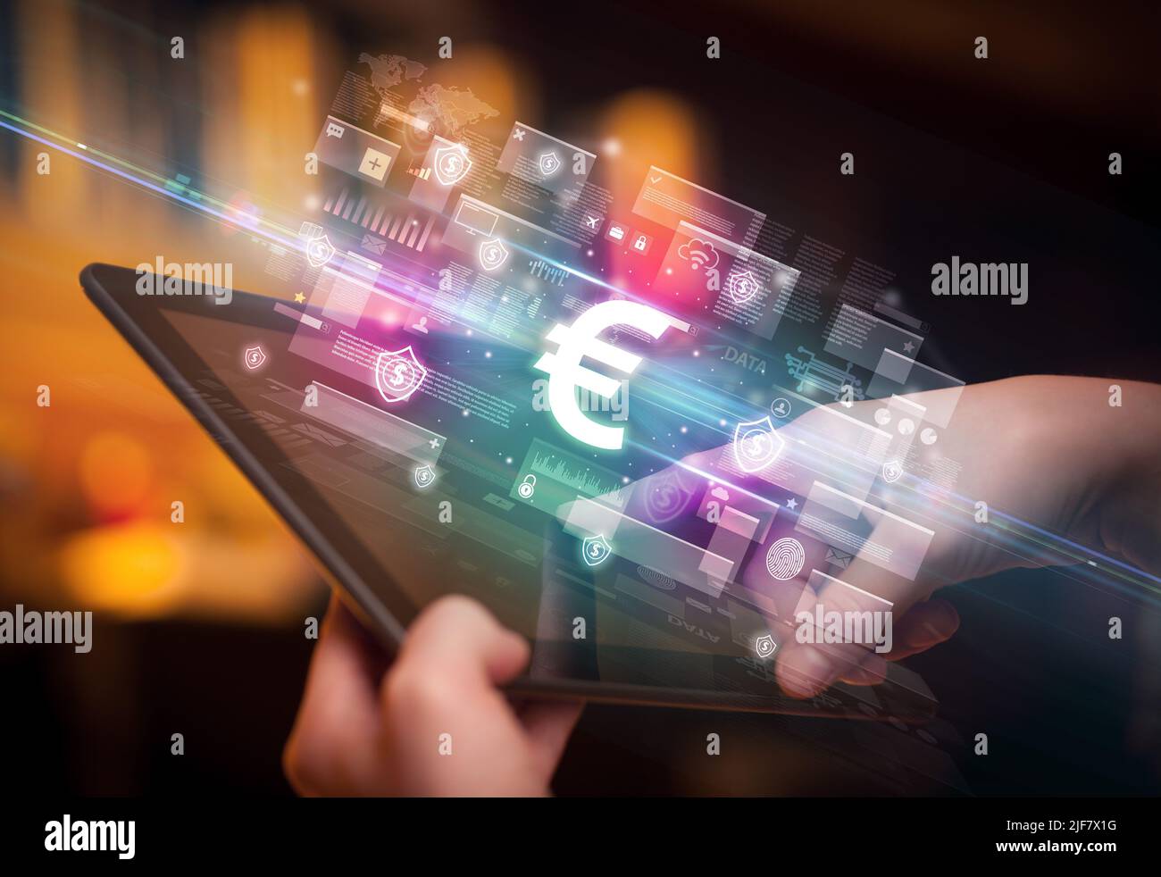 Close-up of a hand using tablet, currency concept Stock Photo - Alamy