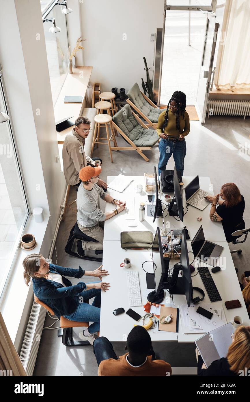 Computer programmers planning business strategy during meeting at tech ...