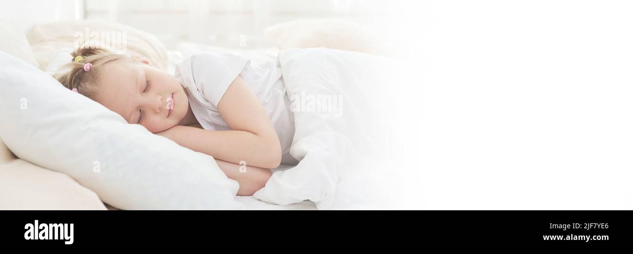 A cute little girl enjoys an afternoon nap in bed after dinner. Web ...