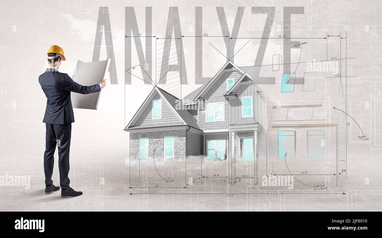 Young engineer holding blueprint concept Stock Photo - Alamy