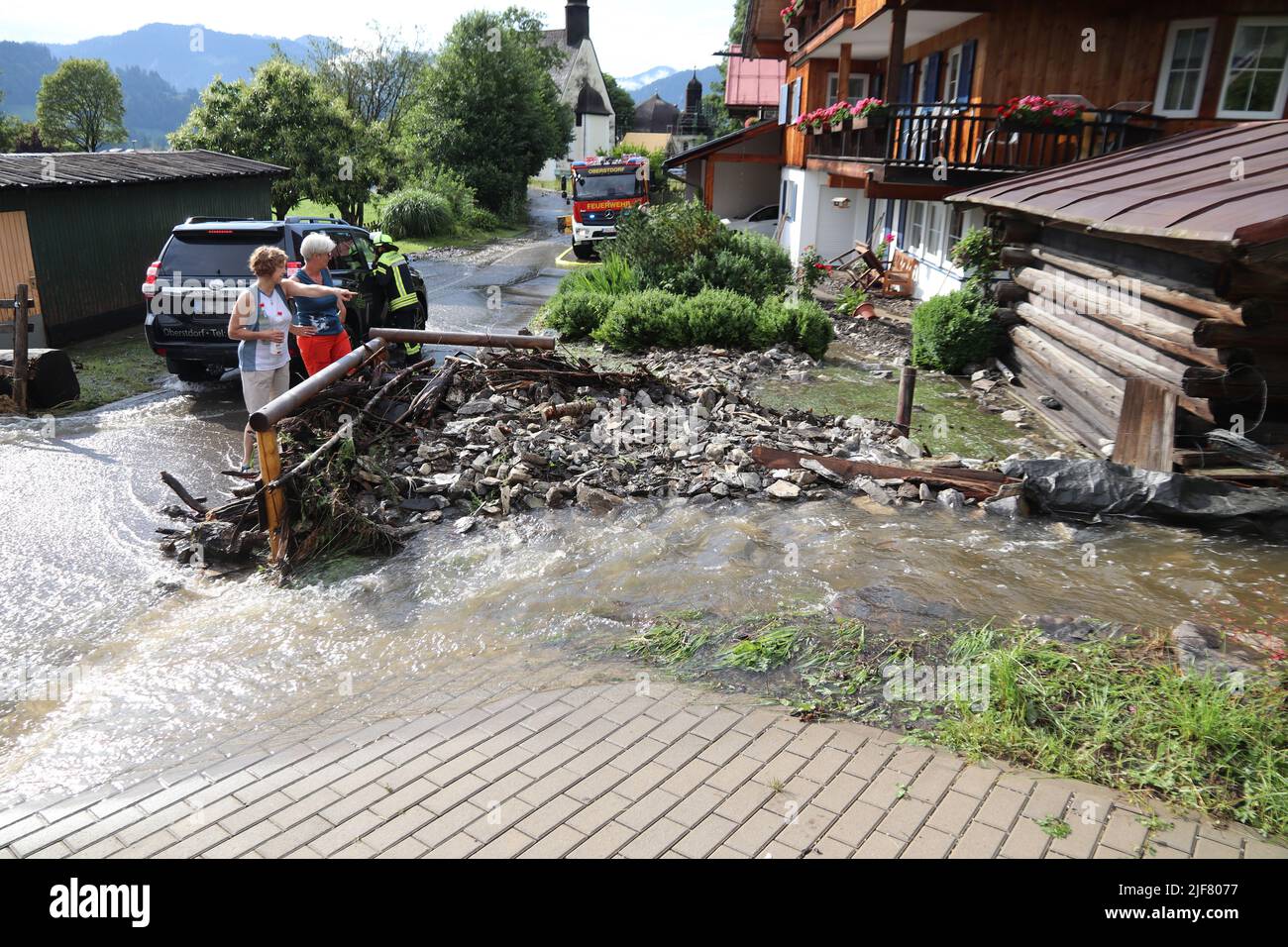 Oberstdorf, Germany. 30th June, 2022. Residents look at the damage ...