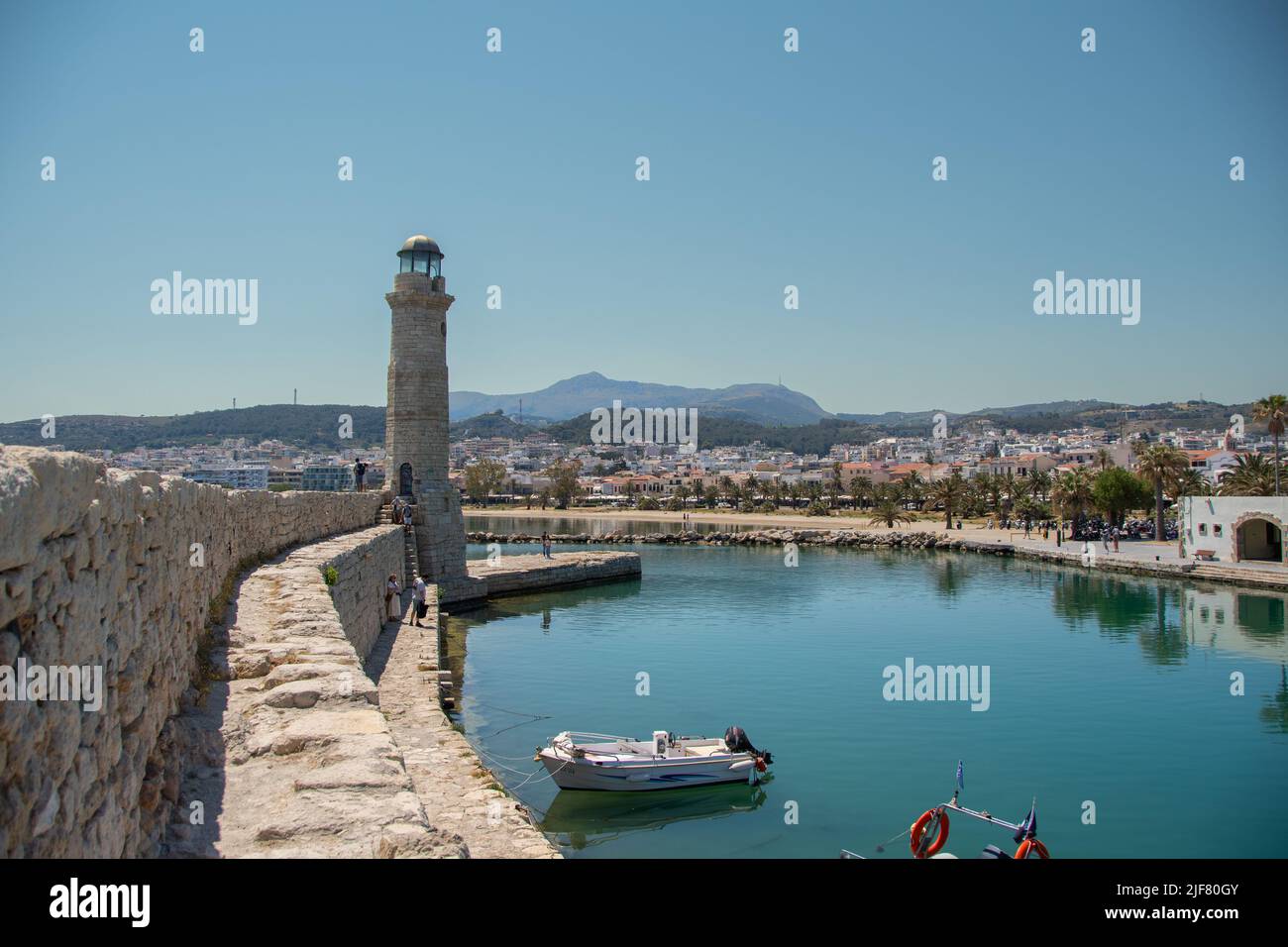 The old Venetian port of Rethymno with lighthouse Stock Photo - Alamy