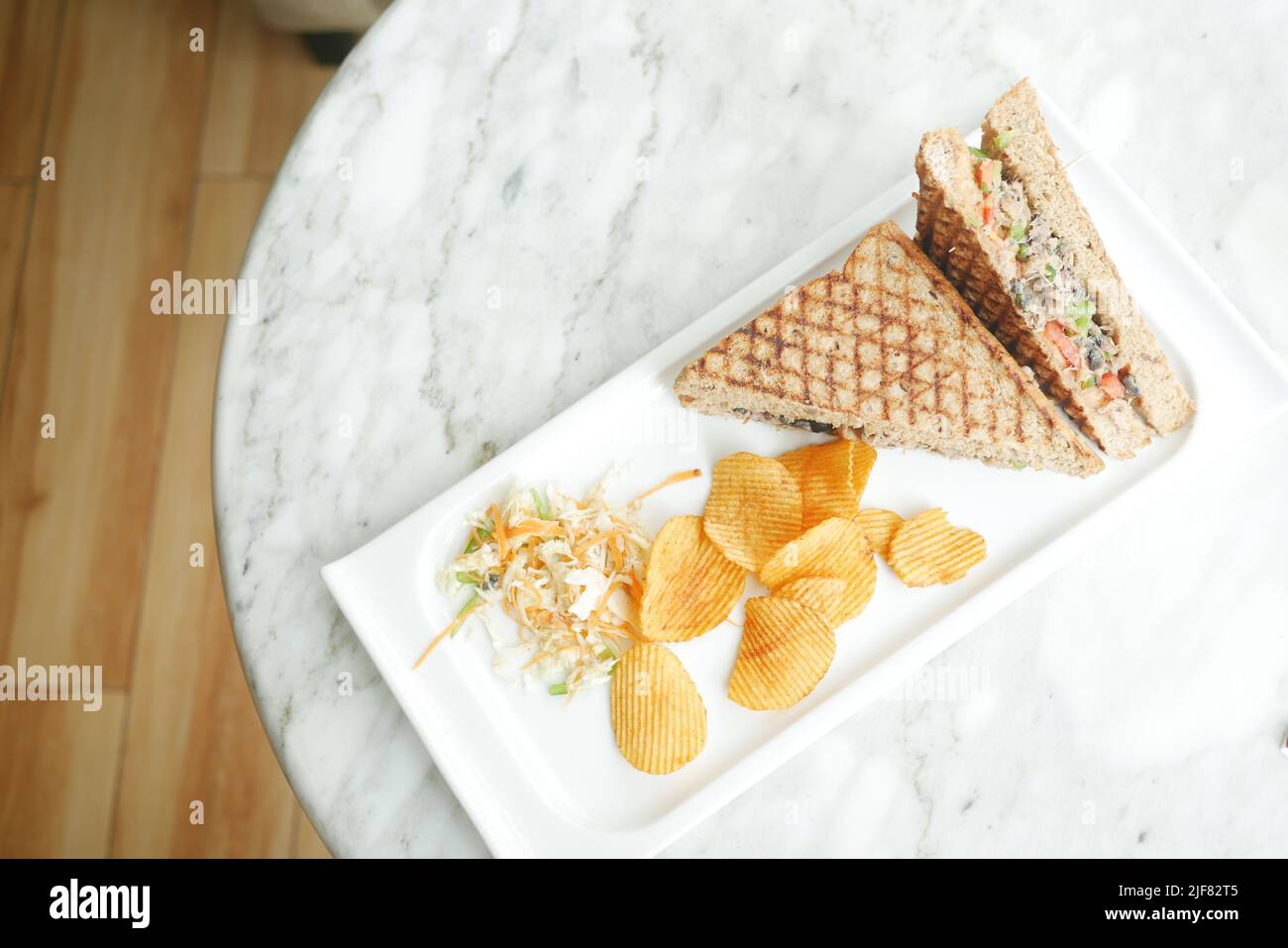 Fish and chips sandwich board hi-res stock photography and images - Alamy