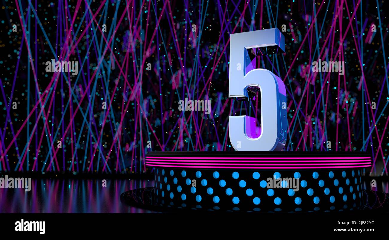 Solid number 5 reflective on a round stage with blue and magenta lights ...