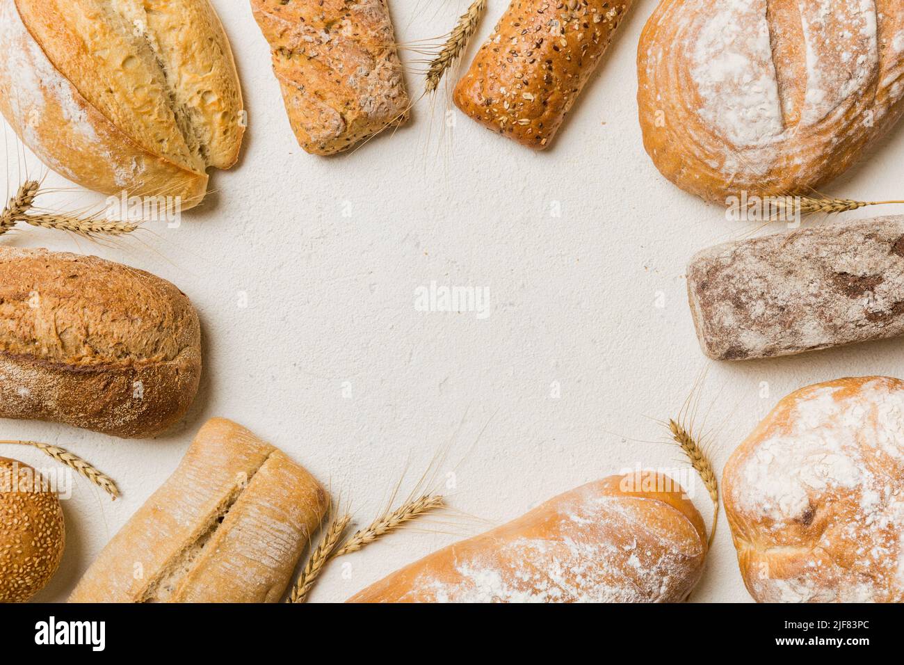 Homemade natural breads. Different kinds of fresh bread as background ...