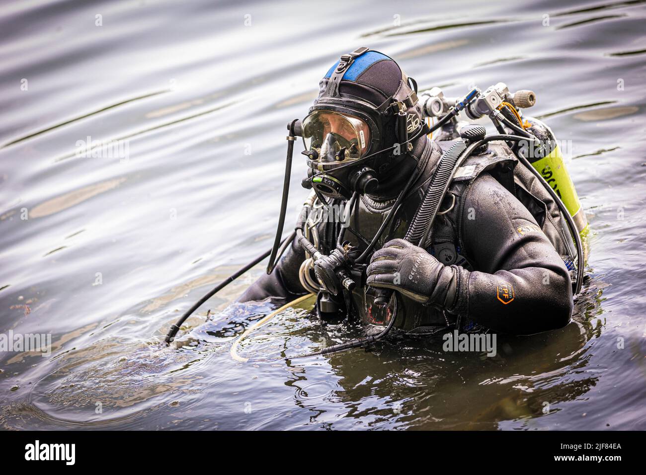 Hanover, Germany. 30th June, 2022. A rescue diver stands in the water ...