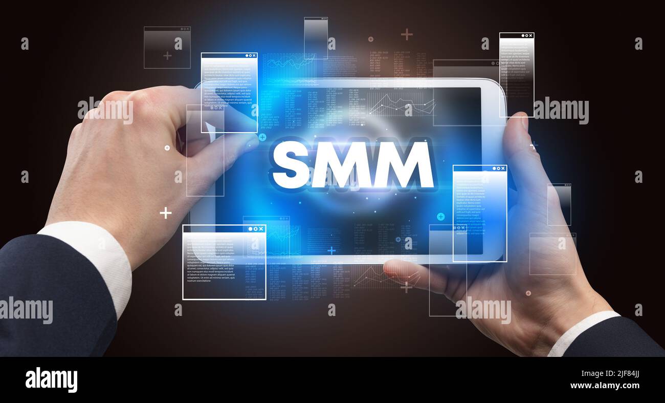 Close-up of a hand holding tablet Stock Photo - Alamy