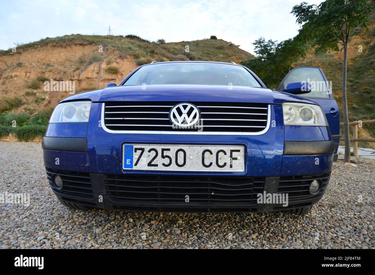 Typical european street car in the night. Volkswagen Passat 1.9 tdi ...