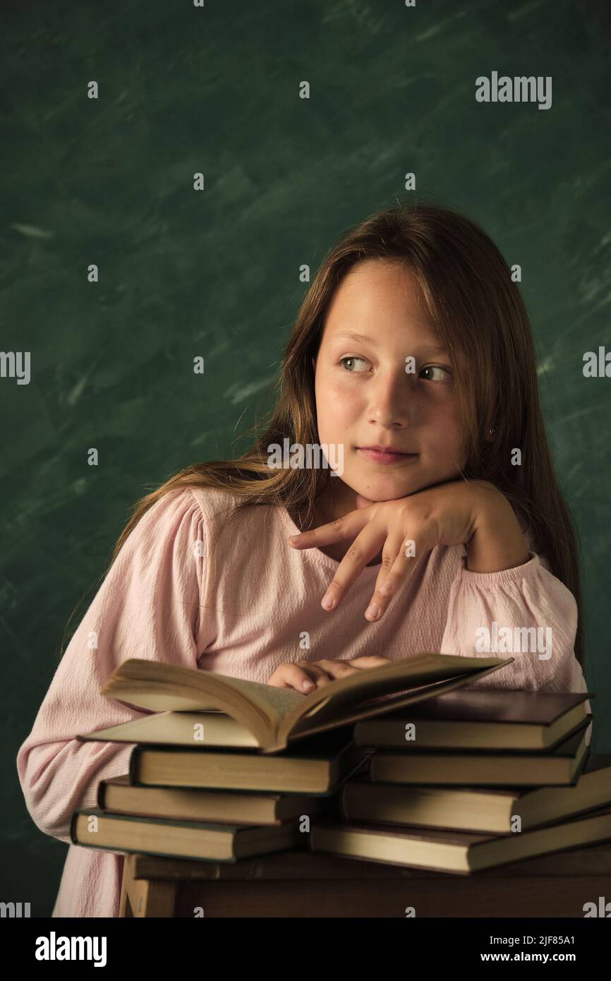girl posing education with books Stock Photo - Alamy