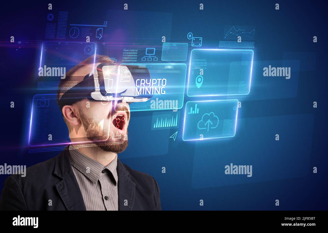 Businessman looking through Virtual Reality glasses, tech concept Stock ...
