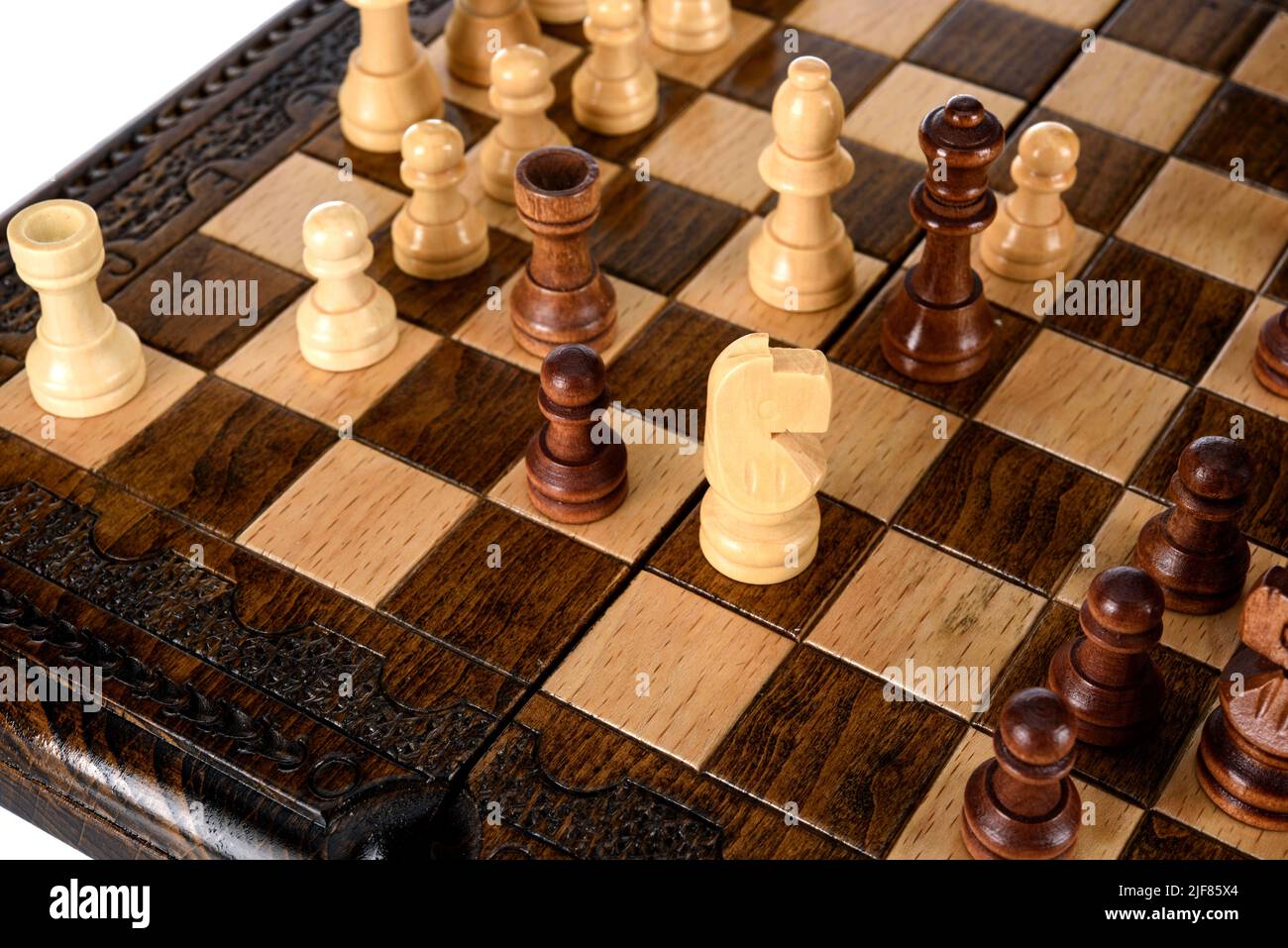 Beige Brown Wooden chess different pieces figures standing on ...