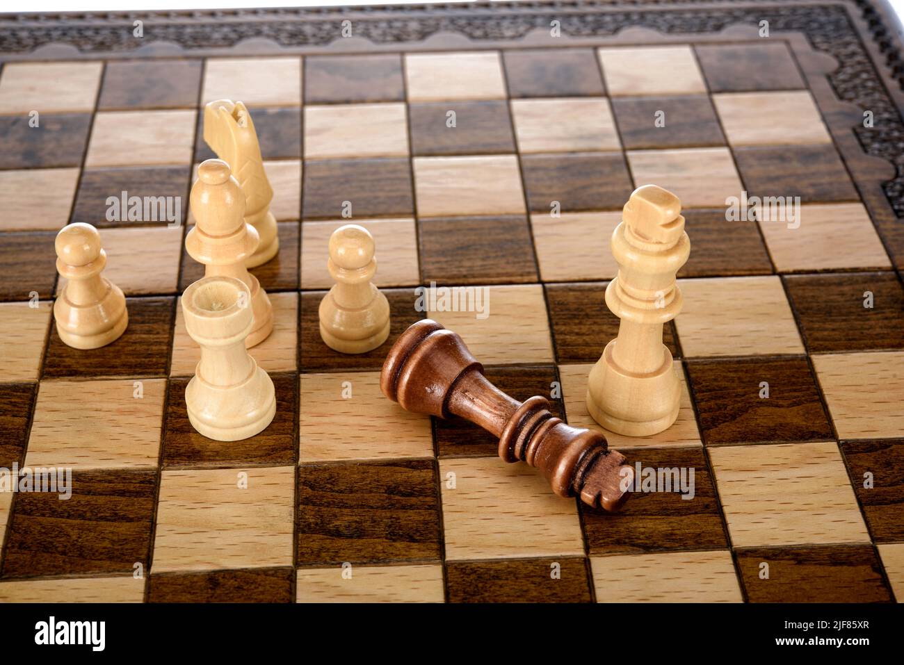 Beige Brown Wooden chess different pieces figures standing on ...