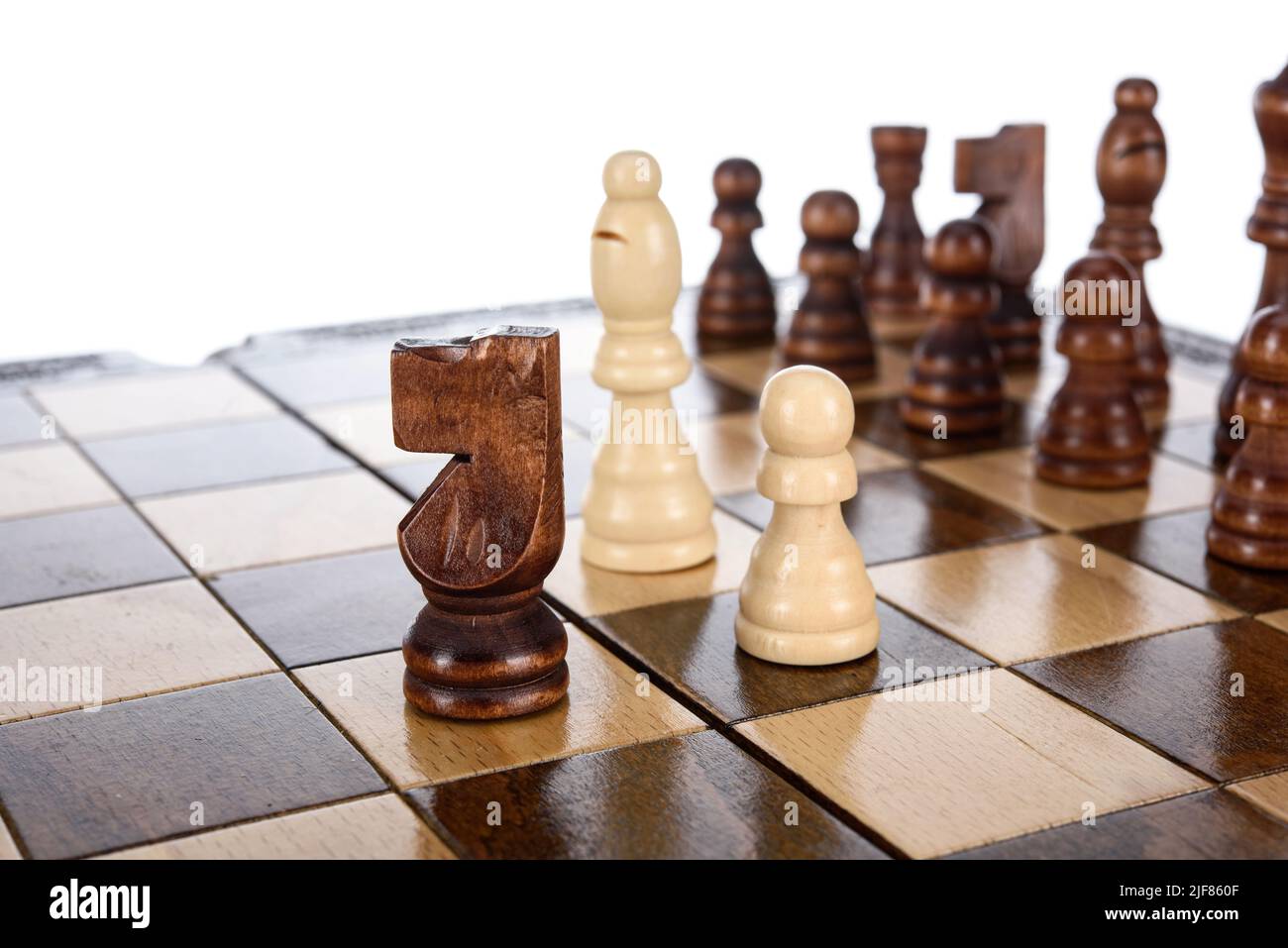 Beige Brown Wooden chess different pieces figures standing on ...