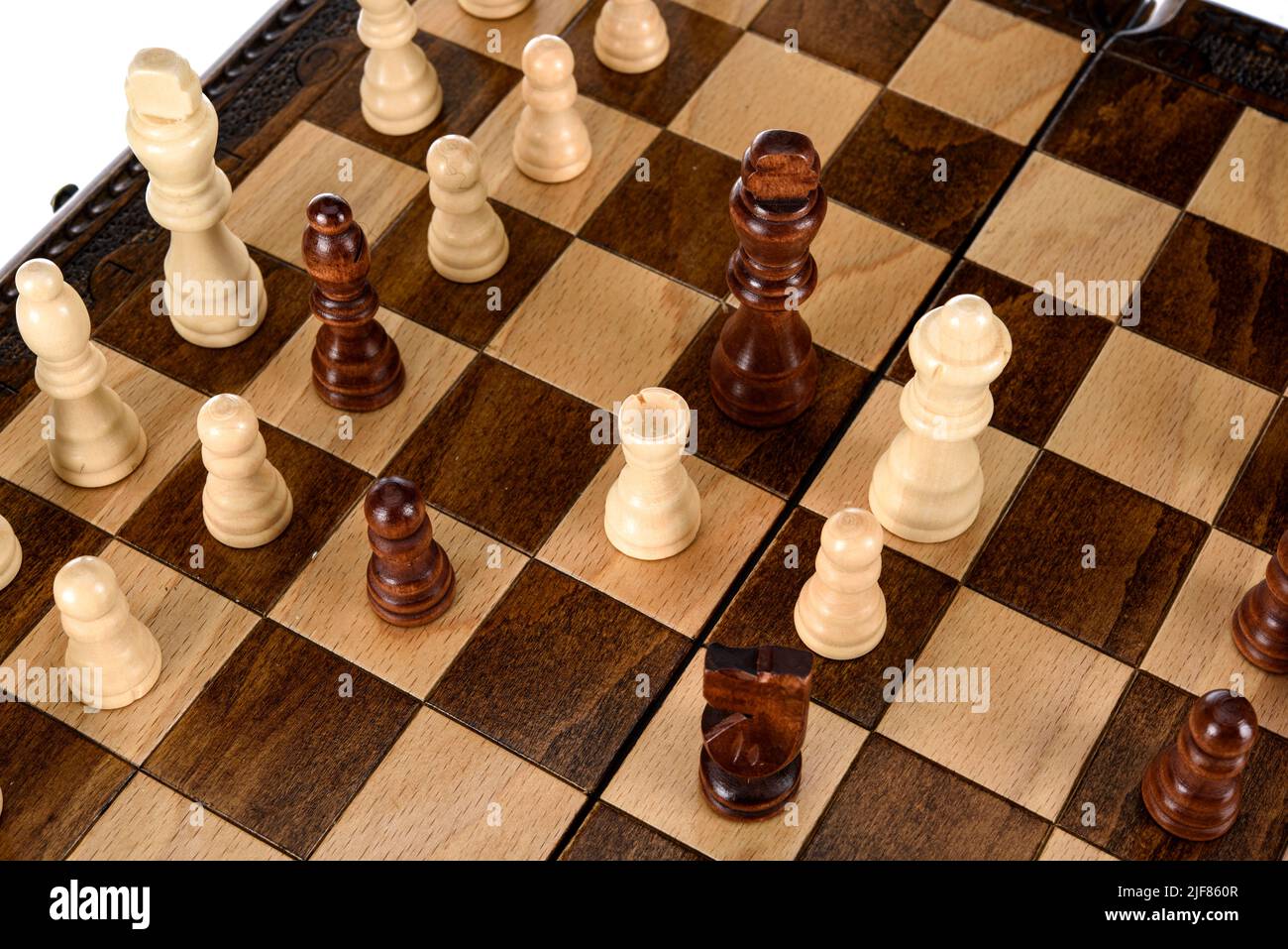Beige Brown Wooden chess different pieces figures standing on ...