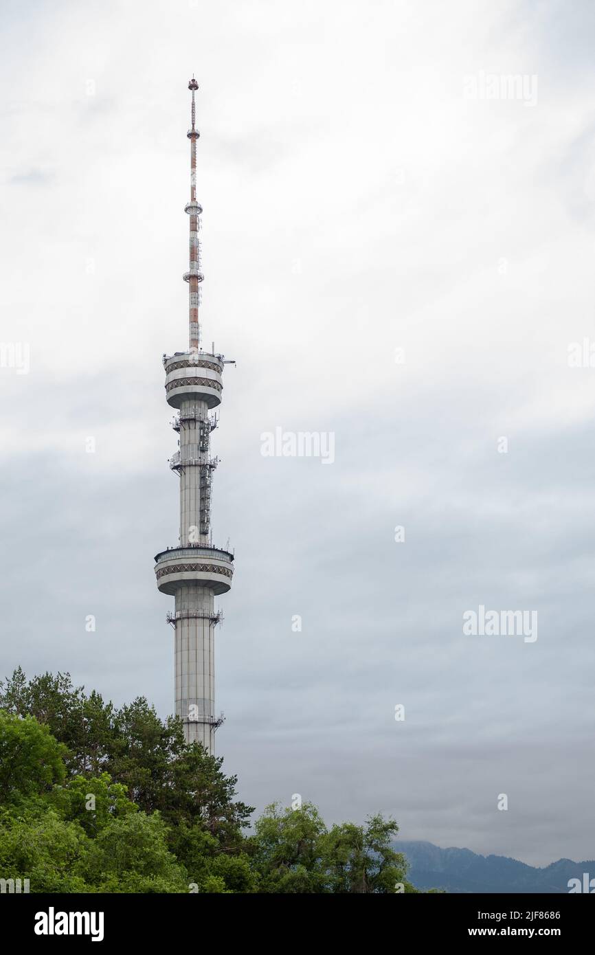 construction of a TV tower among trees and sky Stock Photo - Alamy