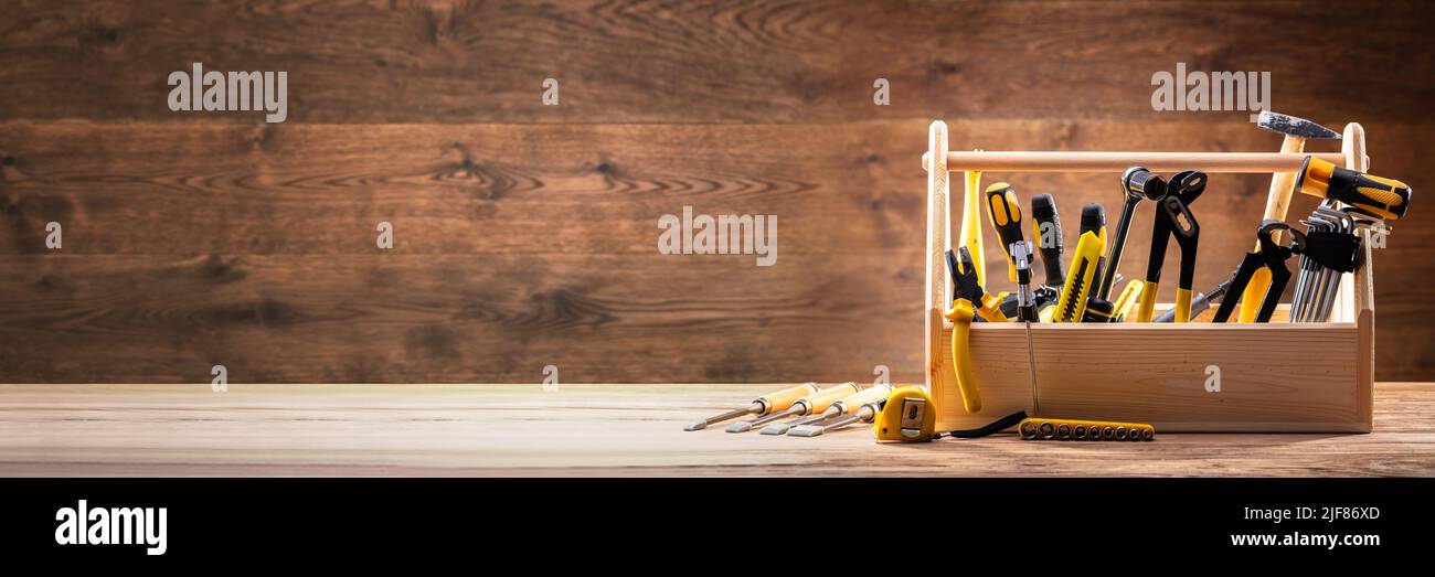 Toolbox With Various Worktools On Wooden Surface Stock Photo - Alamy