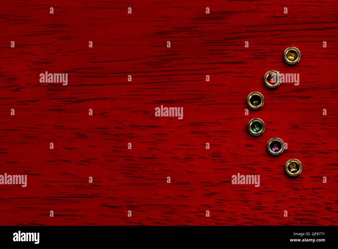 hole detail for strings on the back of electric guitar Stock Photo - Alamy