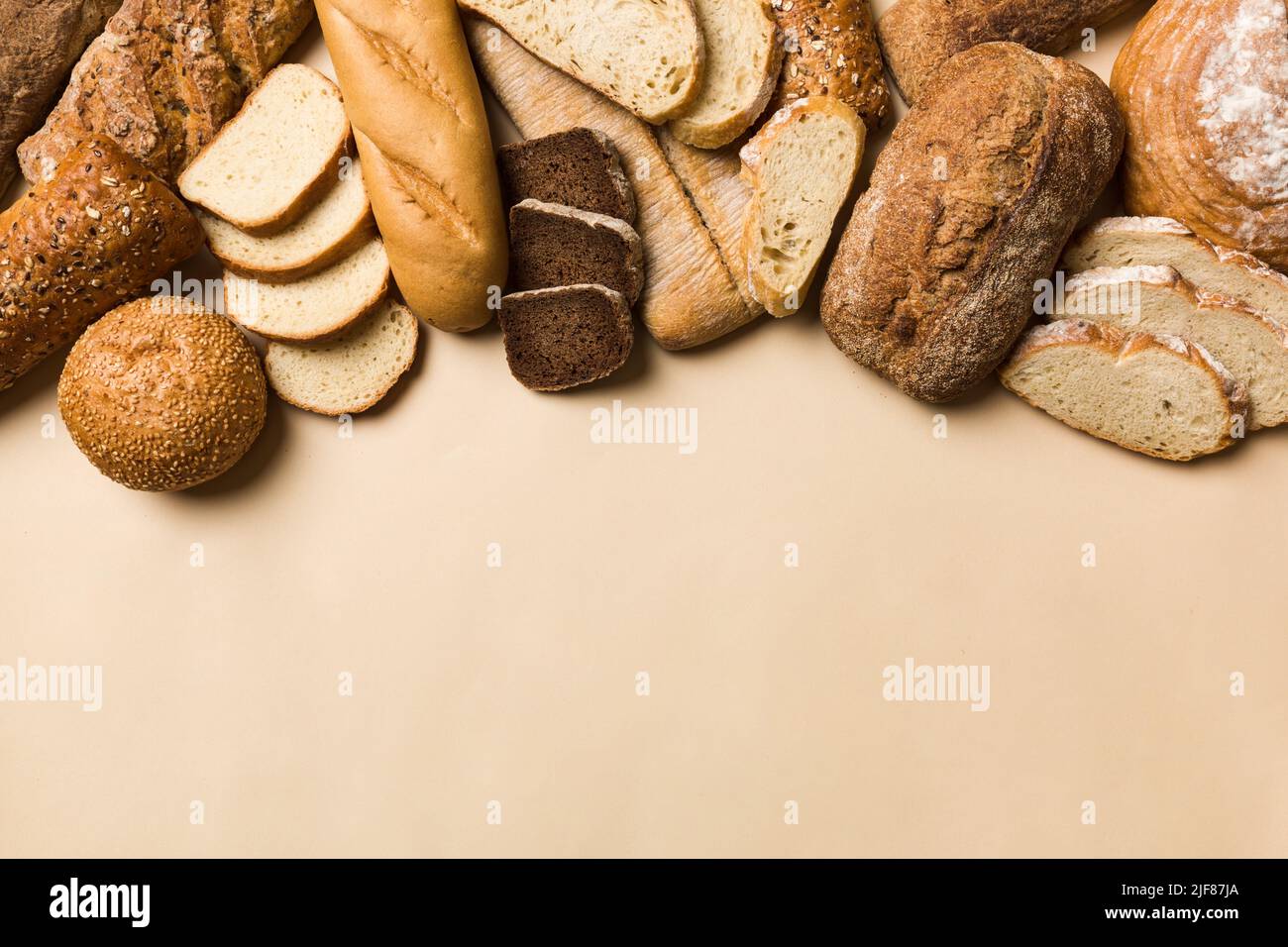 Homemade natural breads. Different kinds of fresh bread as background ...