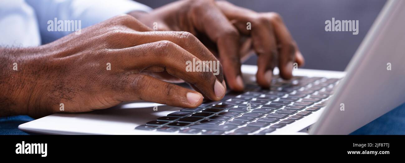 Mans hand working on laptop hi-res stock photography and images - Alamy