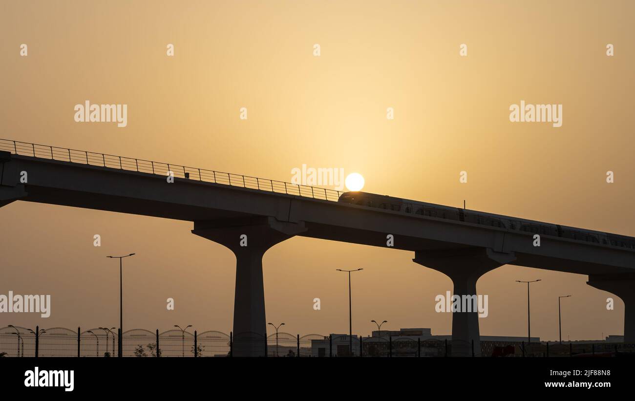Doha, Qatar- June 06,2022 :Qatar red line metro traveling through the ...