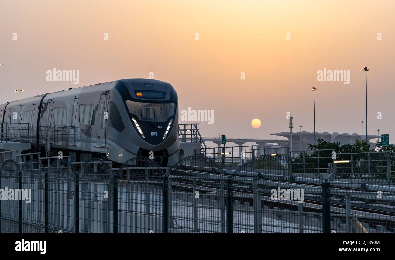Doha, Qatar- June 06,2022 :Qatar red line metro traveling through the ...