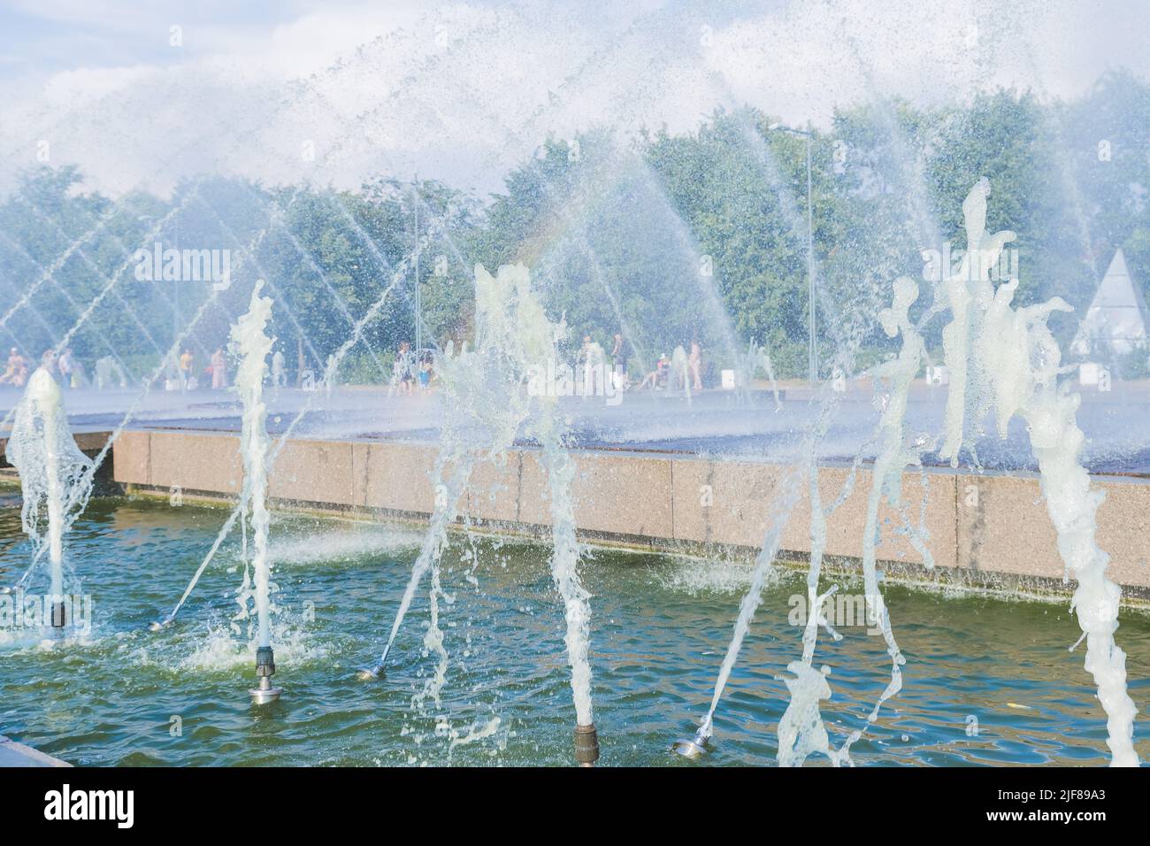 Clean water running from many taps with sparkling drops Stock Photo - Alamy