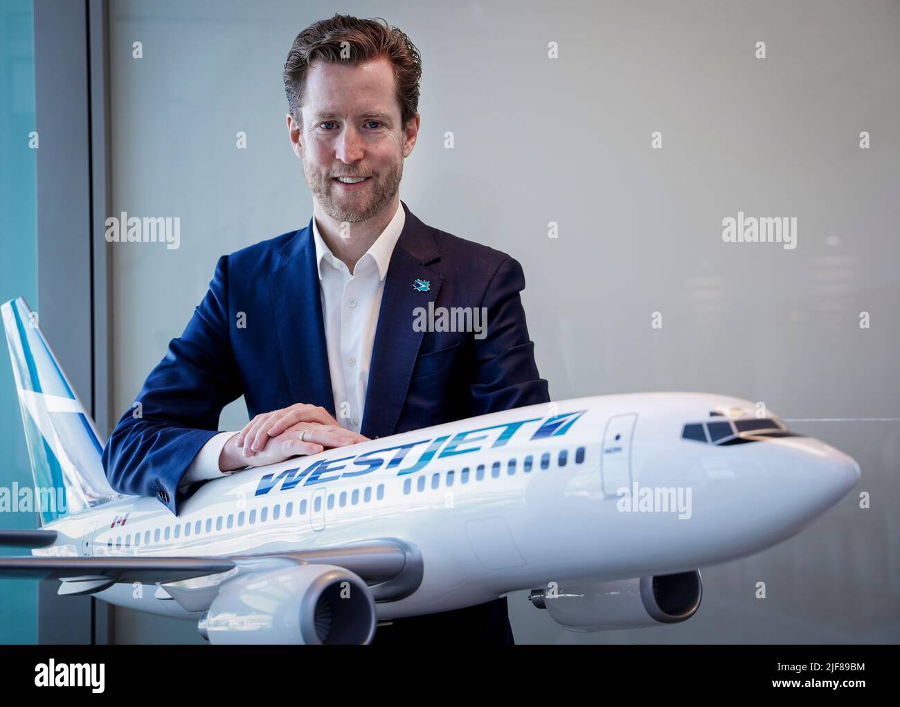 WestJet CEO Alexis von Hoensbroech pauses for a portrait at the airline ...