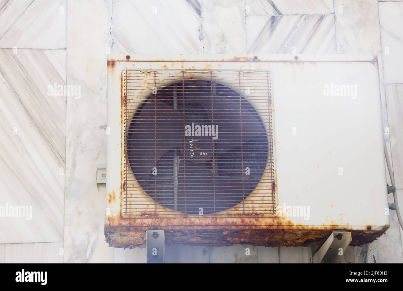 Old rusty air conditioner unit Stock Photo - Alamy