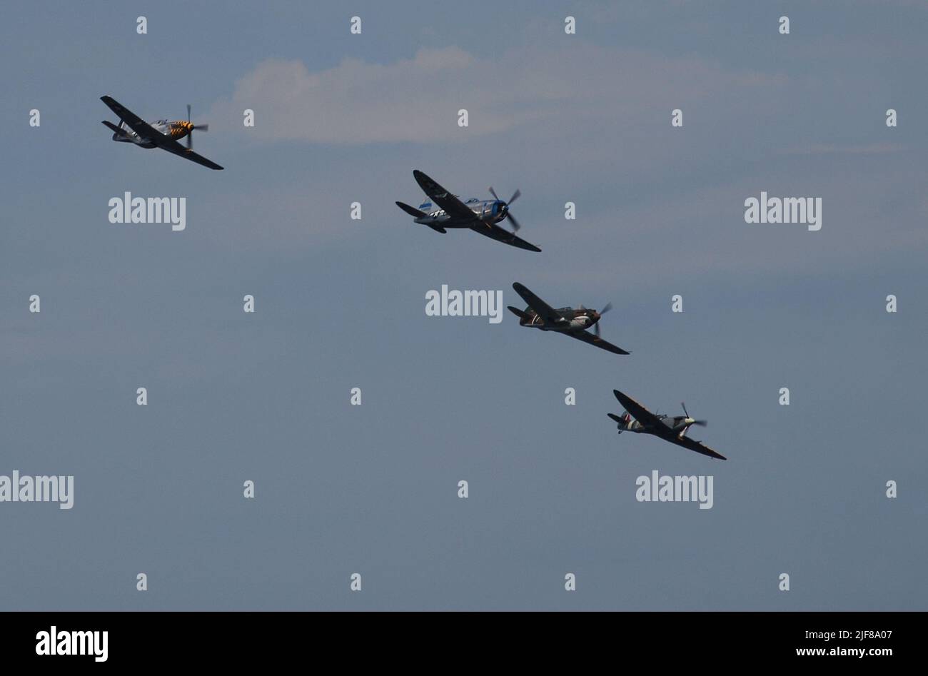 World War II restored fighter planes in flight Stock Photo - Alamy